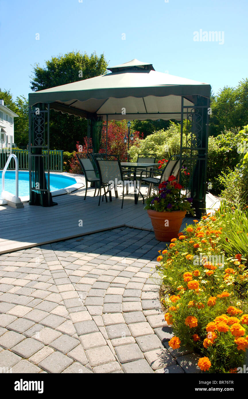 Gazebo In A Sunny Backyard With Swimming Pool Stock Photo - Alamy