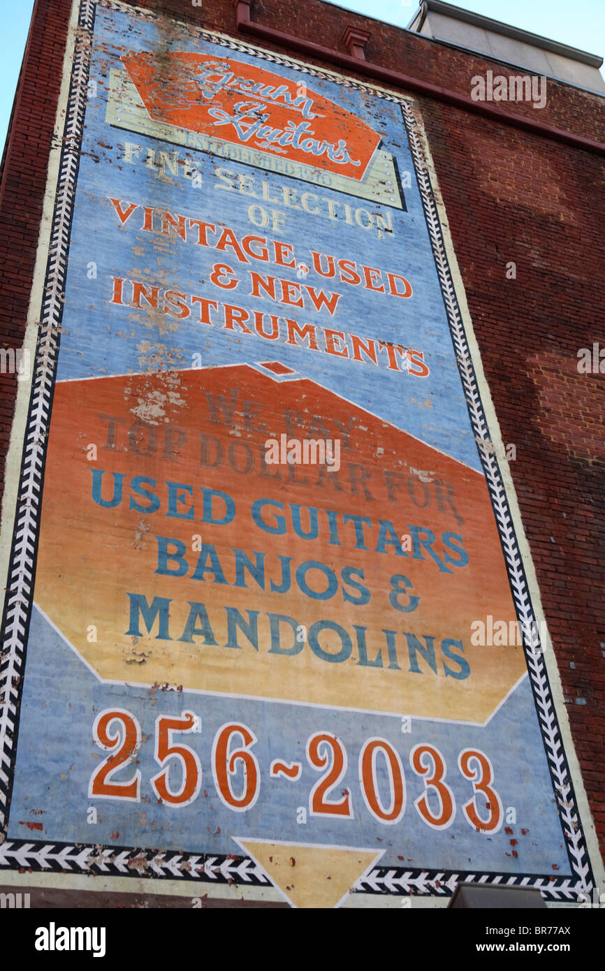 Faded old sign painted onto the brick exterior of the famous Gruhn ...