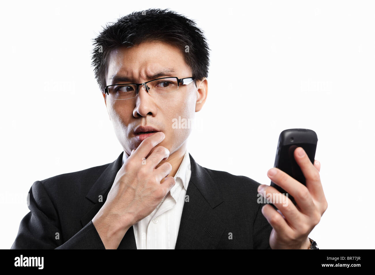 Chinese businessman curious expression when using video call, isolated ...