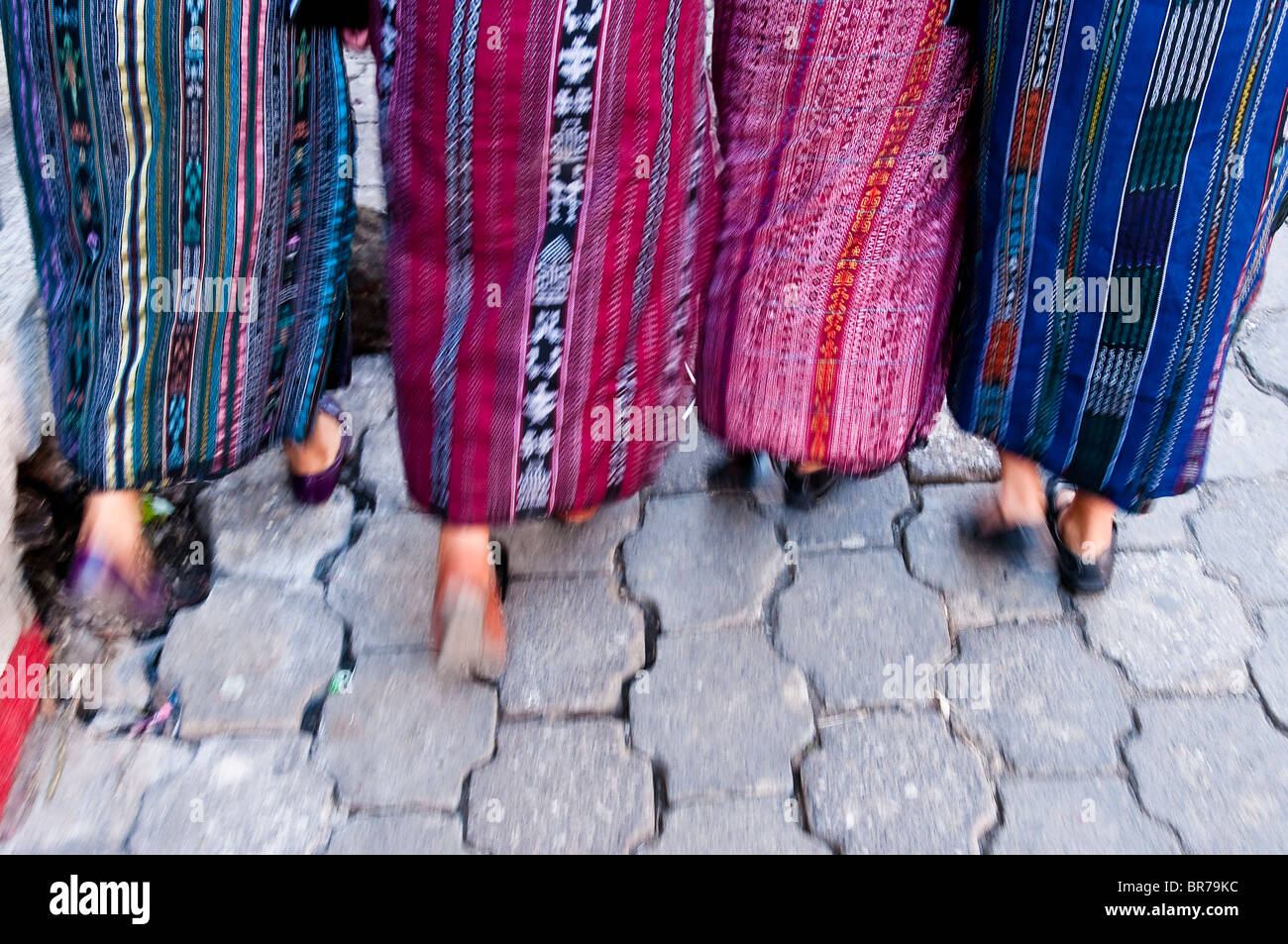 Young Mayan teenager playing on the streets of Santiago Atitlan, Solola ...