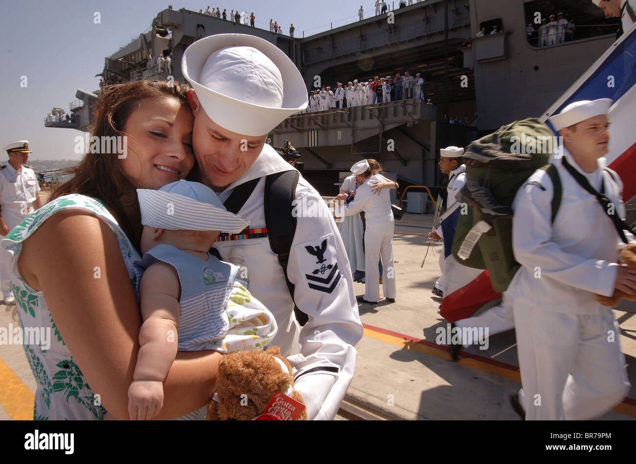 Sailor hugs his wife and baby Stock Photo - Alamy