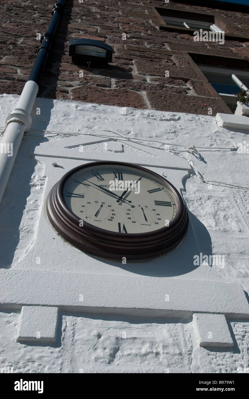 Westminster clock on wall of historic Ship Inn Shorehead Stonehaven ...