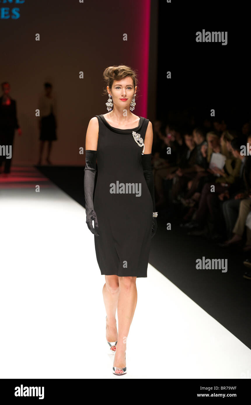 A model walks down the runway at the Caroline Charles Spring/Summer ...