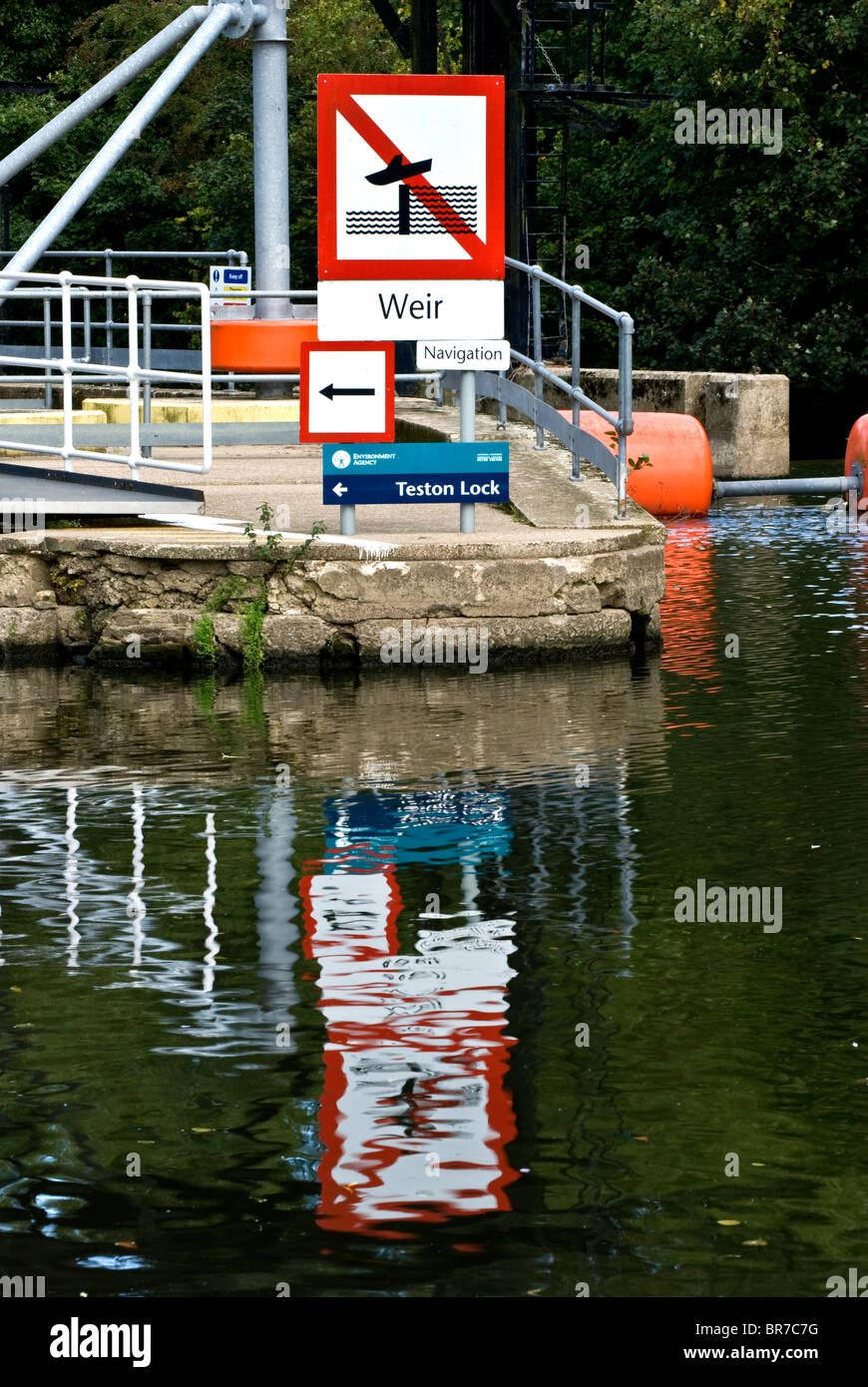 Warning signs reflected in water hi-res stock photography and images ...