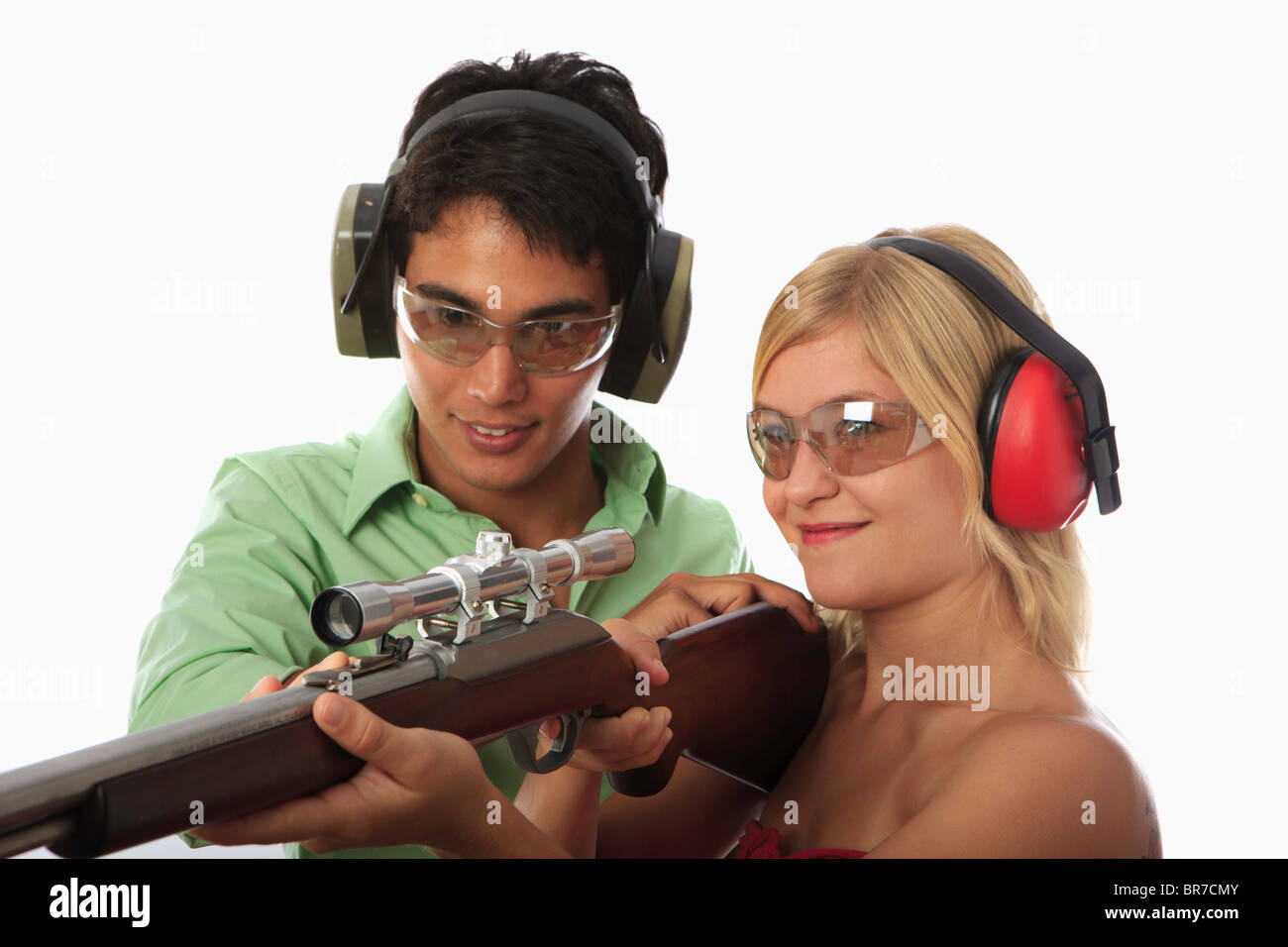 Woman aiming a rifle hi-res stock photography and images - Alamy