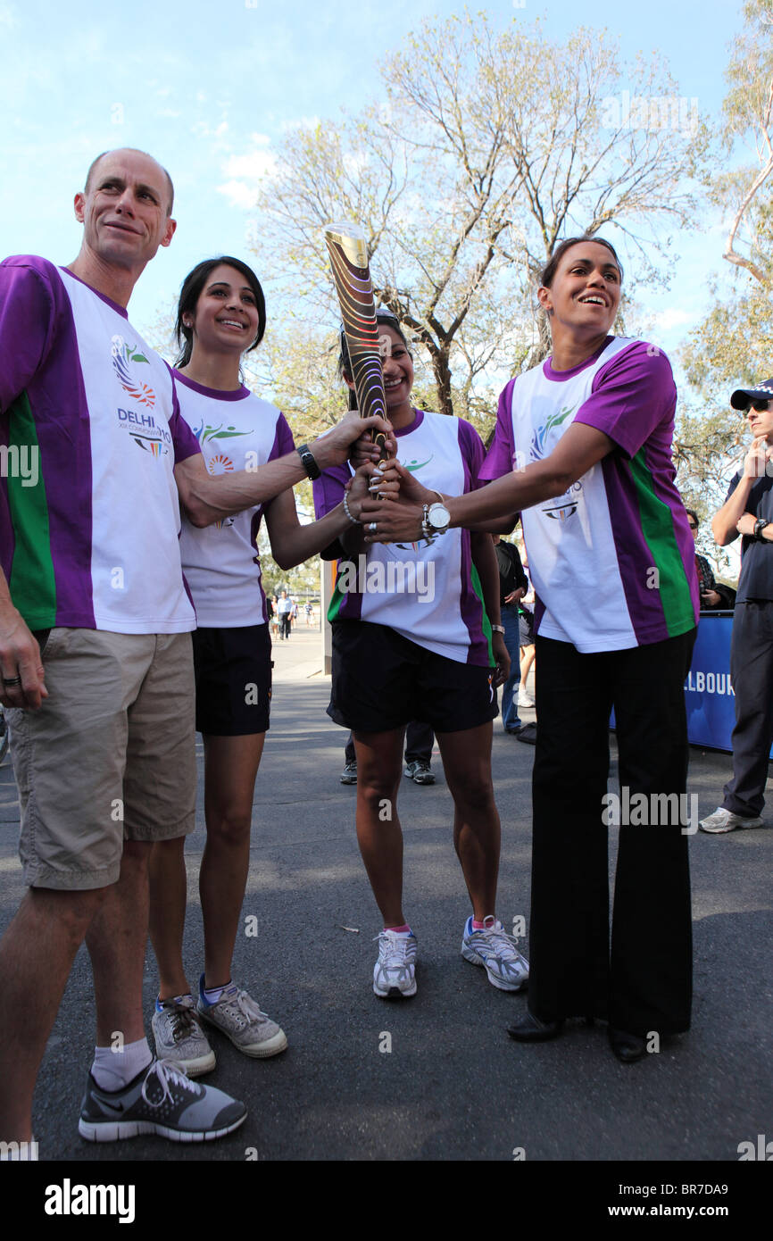 Cathy Freeman and : runner steve moneghetti with the commonwealth torch ...