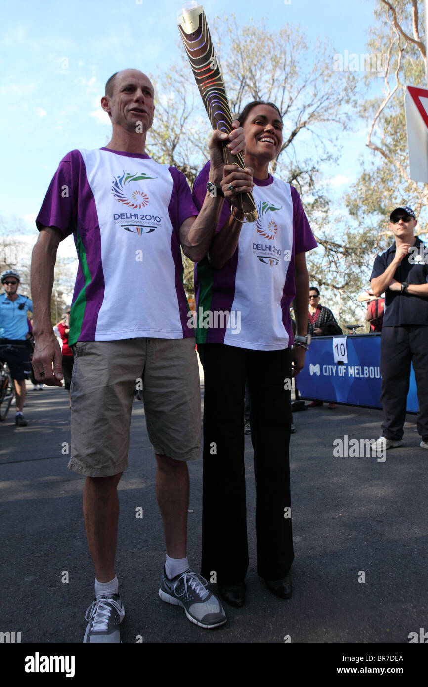 Cathy Freeman and : runner steve moneghetti with the commonwealth torch ...