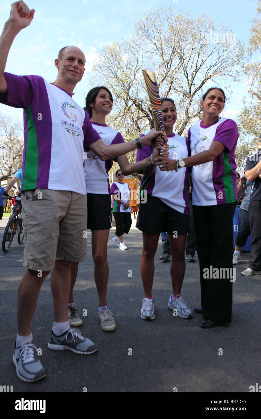 Cathy Freeman and : runner steve moneghetti with the commonwealth torch ...