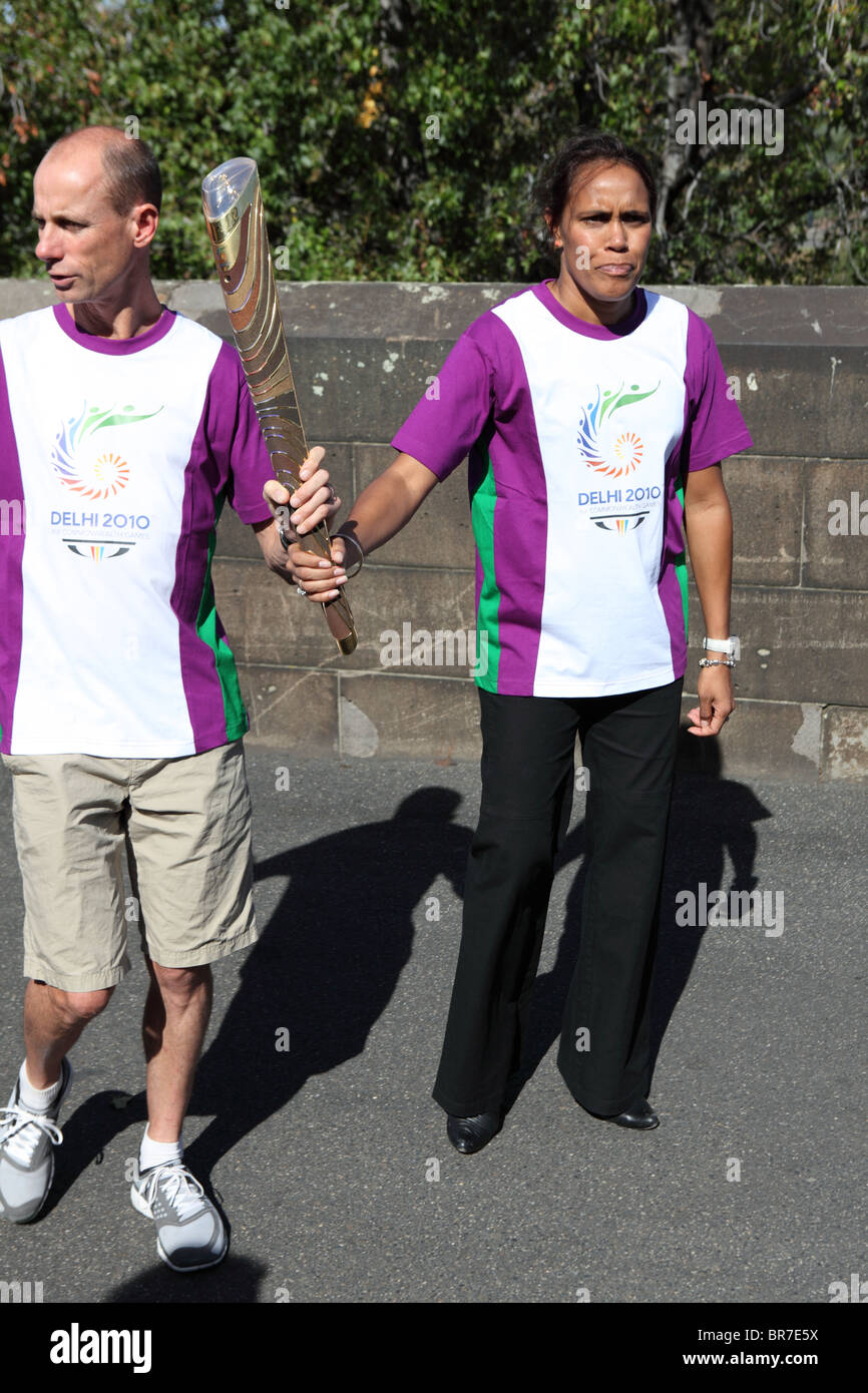 Cathy Freeman and : runner steve moneghetti with the commonwealth torch ...