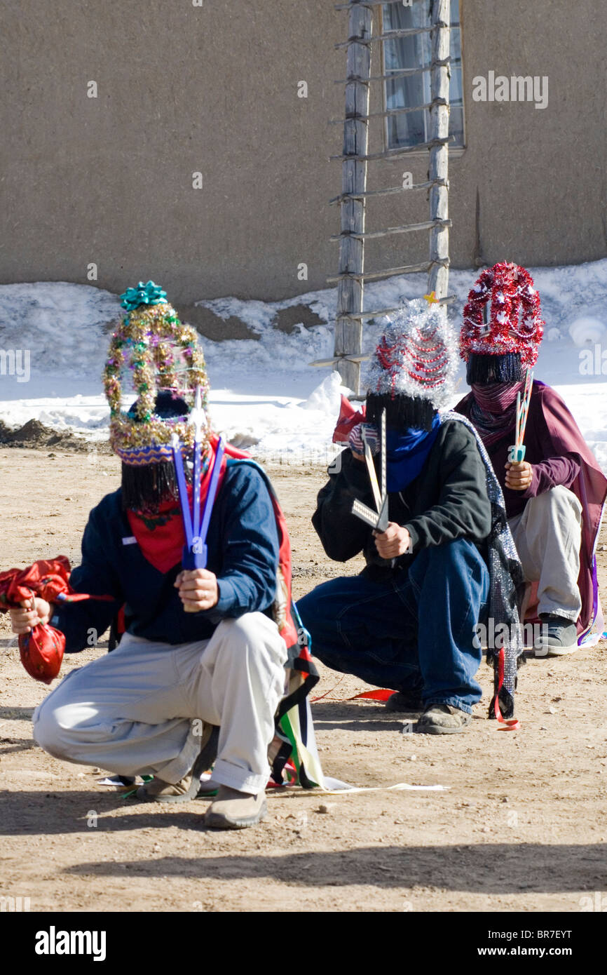 Three men preforming Matachines dance at Picuris Pueblo New Mexico ...