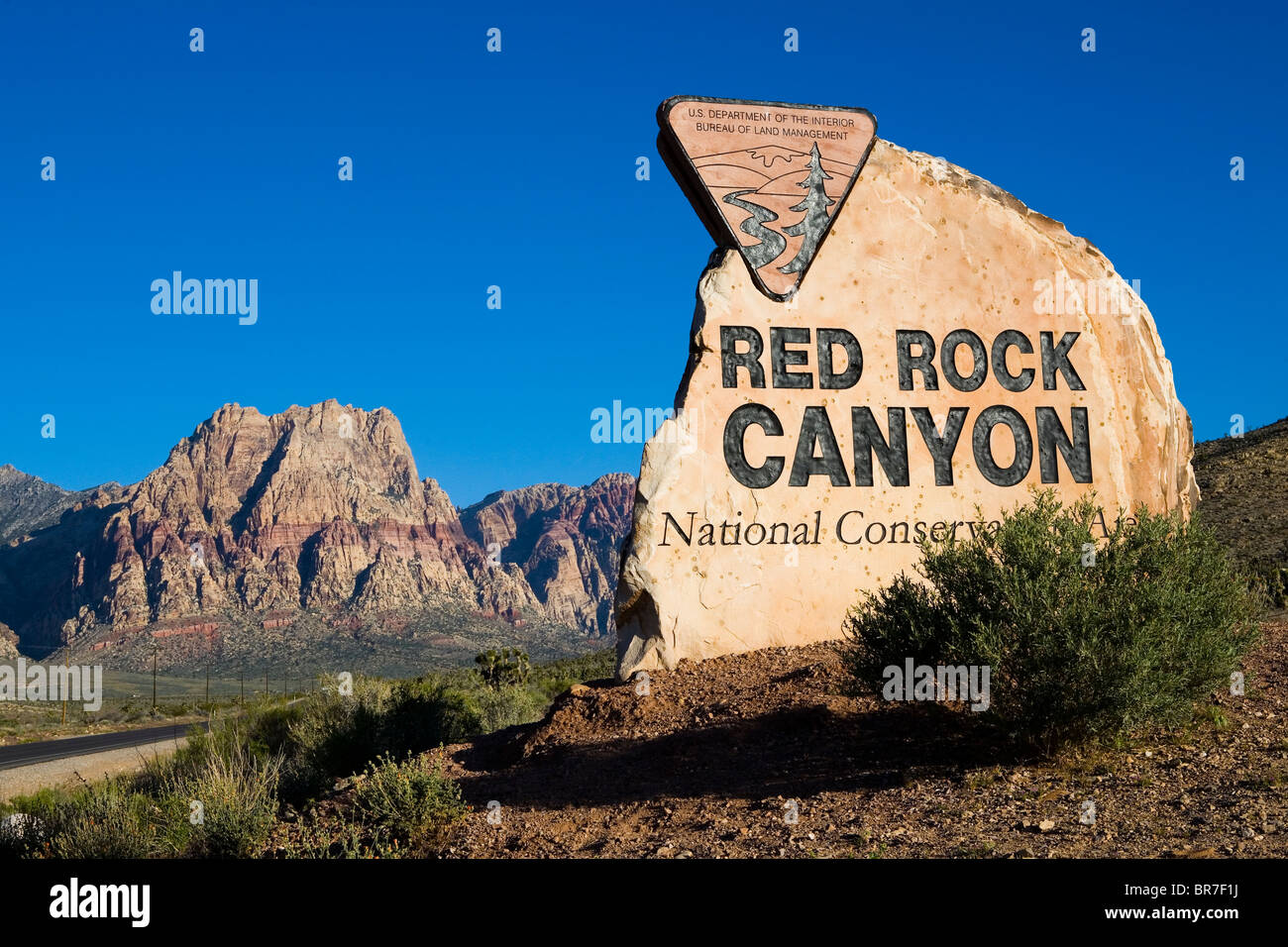 The Red Rocks National Conservation sign marks the area bounadry with ...