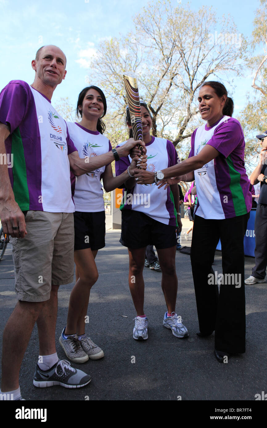 Cathy Freeman and : runner steve moneghetti with the commonwealth torch ...