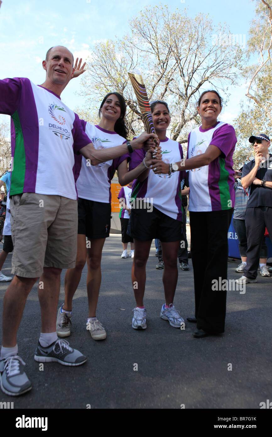 Cathy Freeman and : runner steve moneghetti with the commonwealth torch ...
