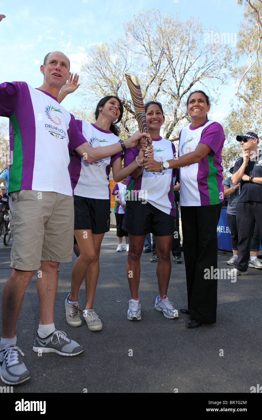 Cathy Freeman and : runner steve moneghetti with the commonwealth torch ...