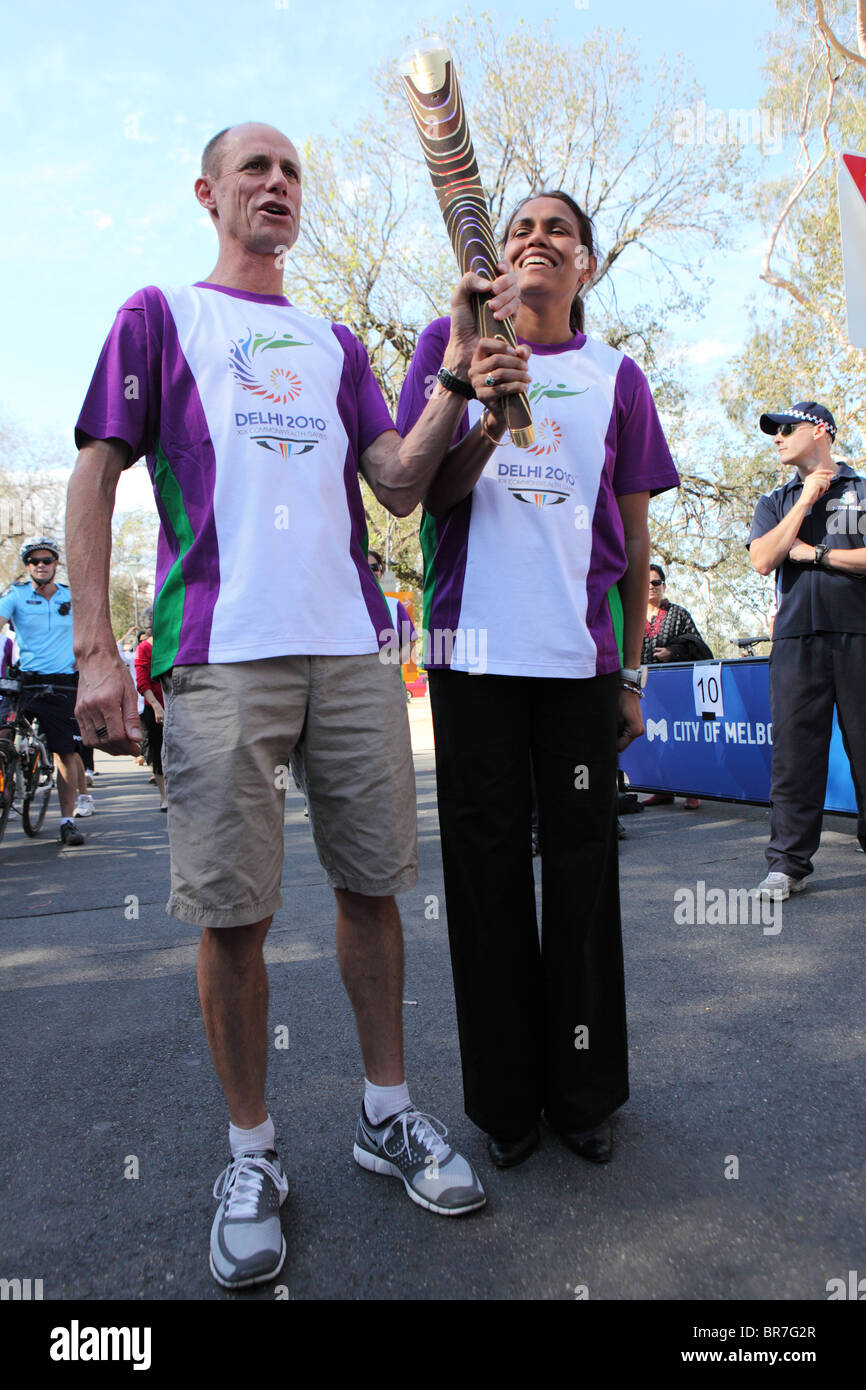 Cathy Freeman and : runner steve moneghetti with the commonwealth torch ...
