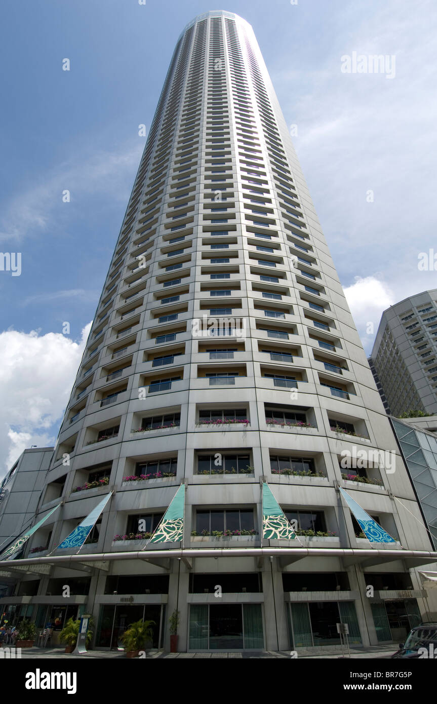Single round skyscraper towers towards the sky Stock Photo - Alamy