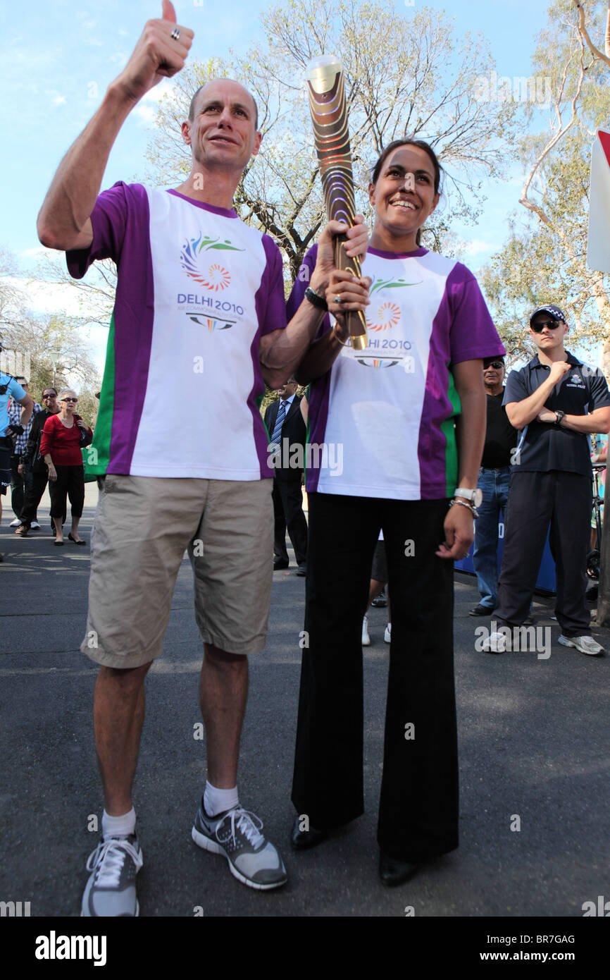 Cathy Freeman and : runner steve moneghetti with the commonwealth torch ...