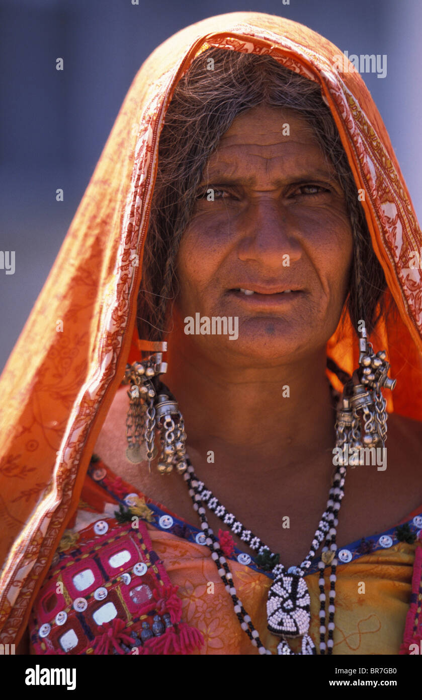 Headshot / portrait of a female villager wearing traditional clothing ...