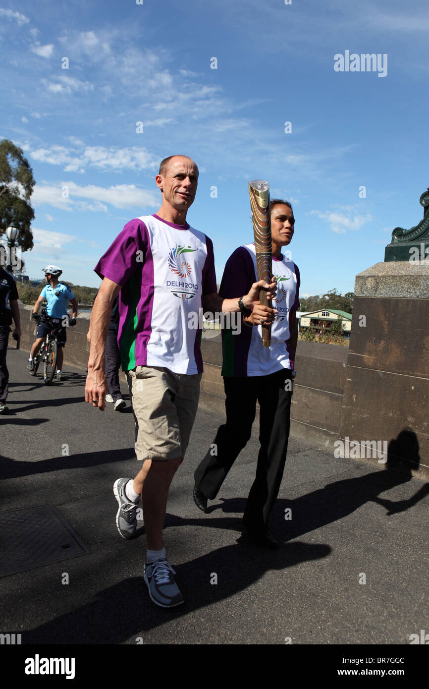 Cathy Freeman and : runner steve moneghetti with the commonwealth torch ...