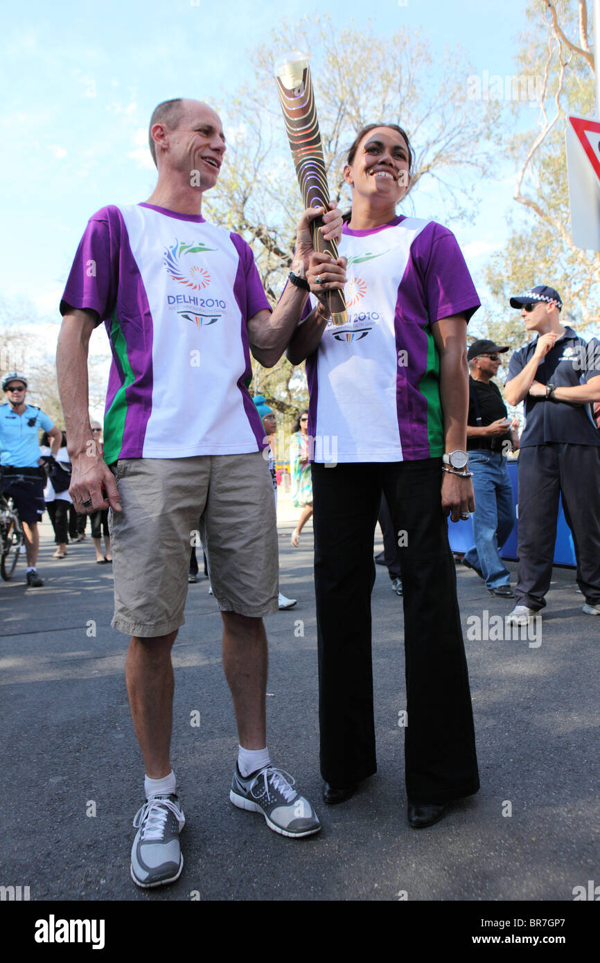 Cathy Freeman and : runner steve moneghetti with the commonwealth torch ...