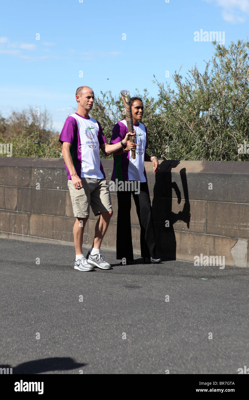 Cathy Freeman and : runner steve moneghetti with the commonwealth torch ...