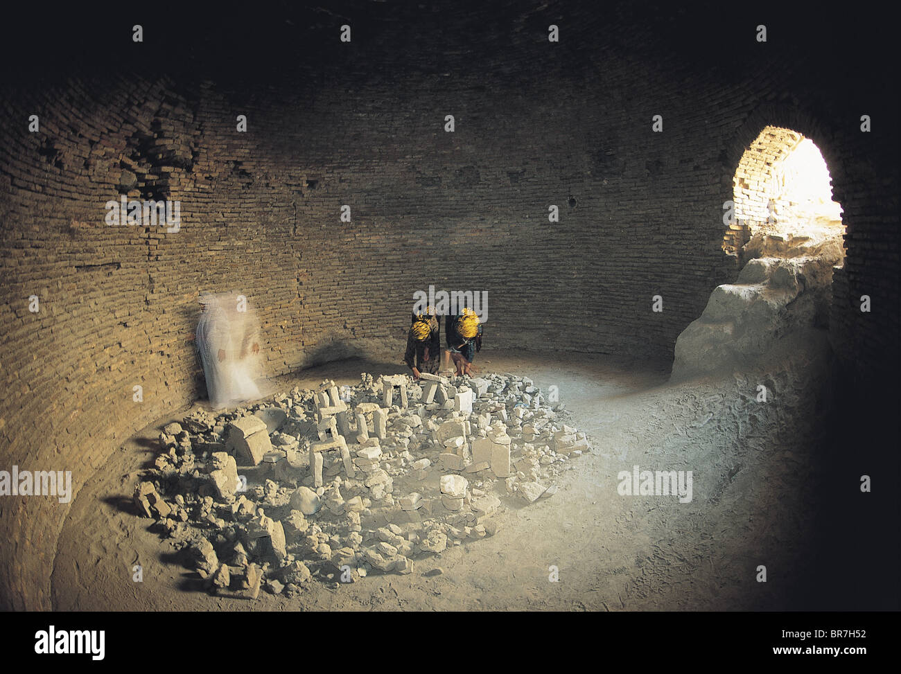 Women building wish stones in evliya seyit cemalettin turbah ...