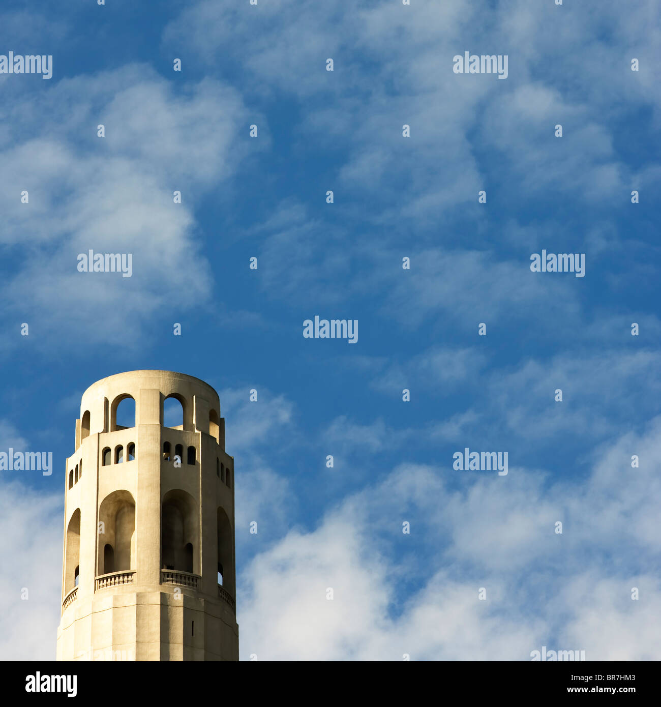 Coit Tower San Francisco CA. against blue cloudy sky Stock Photo - Alamy