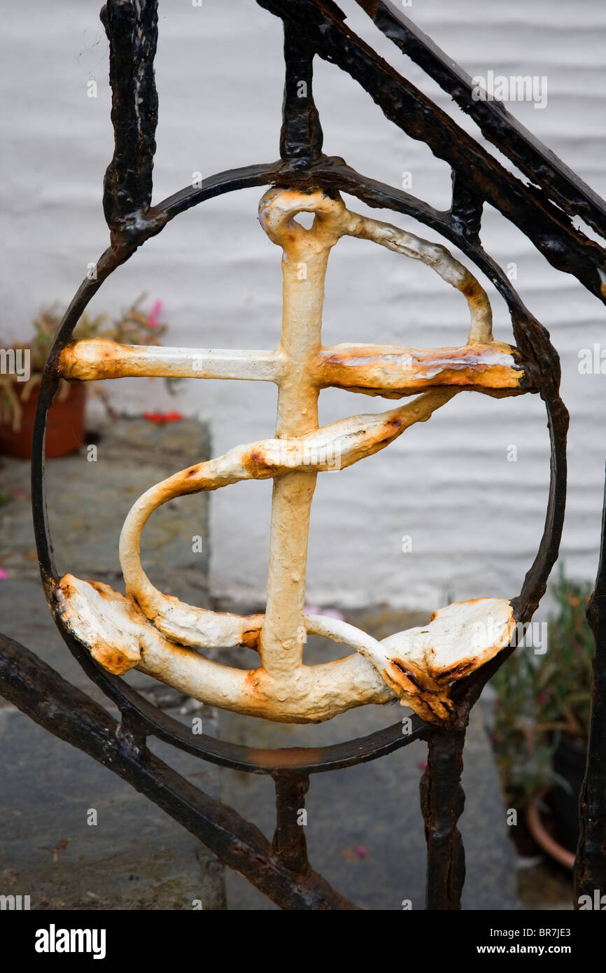 Anchor design in decorative wrought iron gates of a fishermans cottage ...
