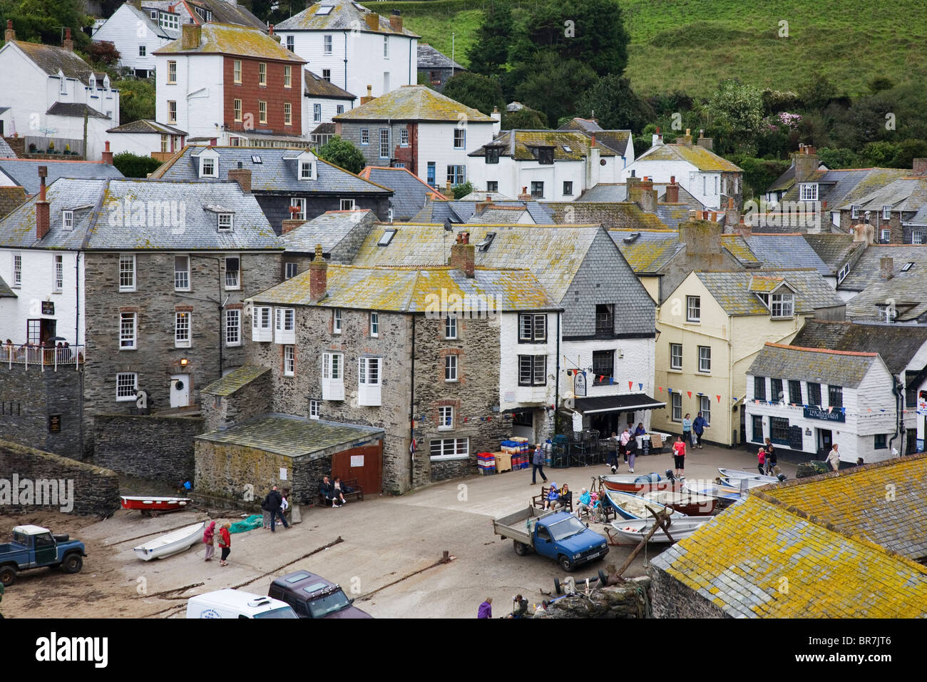 Harbourside stone cottages and buildings at the traditional fishing ...