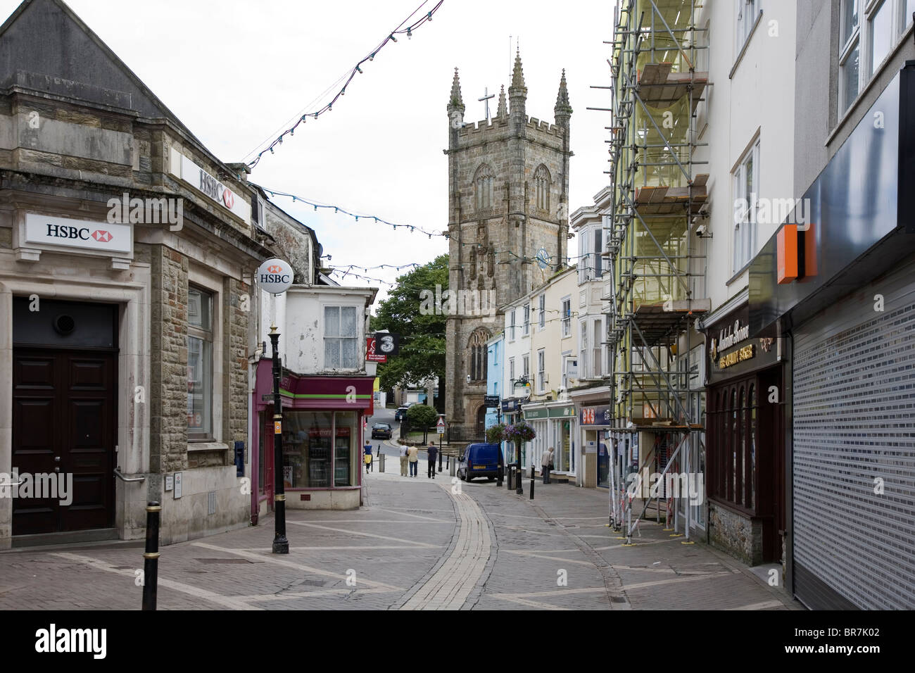 Town centre shopping arcade at St Austell and Holy Trinity Church ...