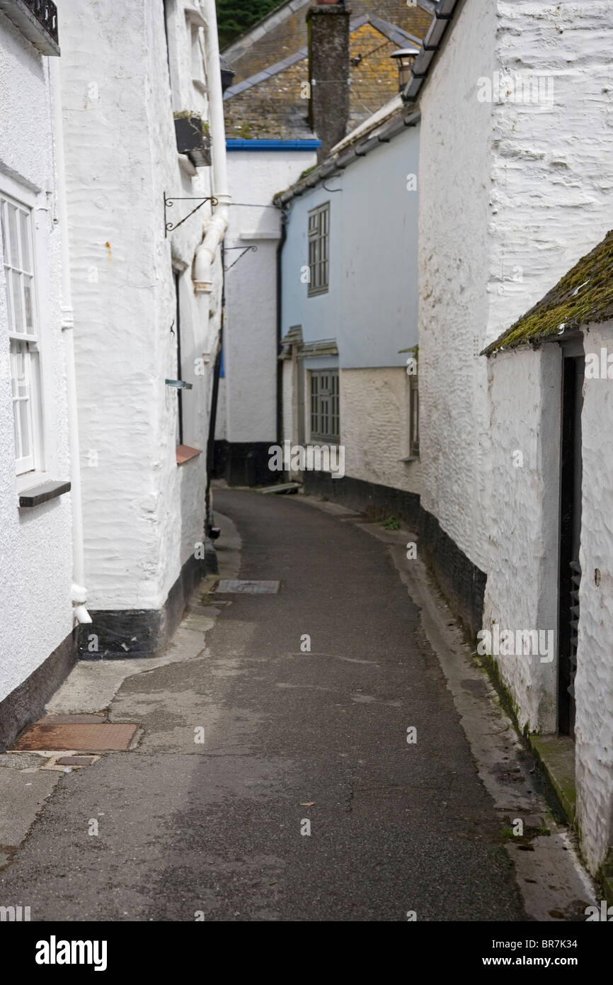 Narrow street alleyway in the traditional cornish fishing village and ...