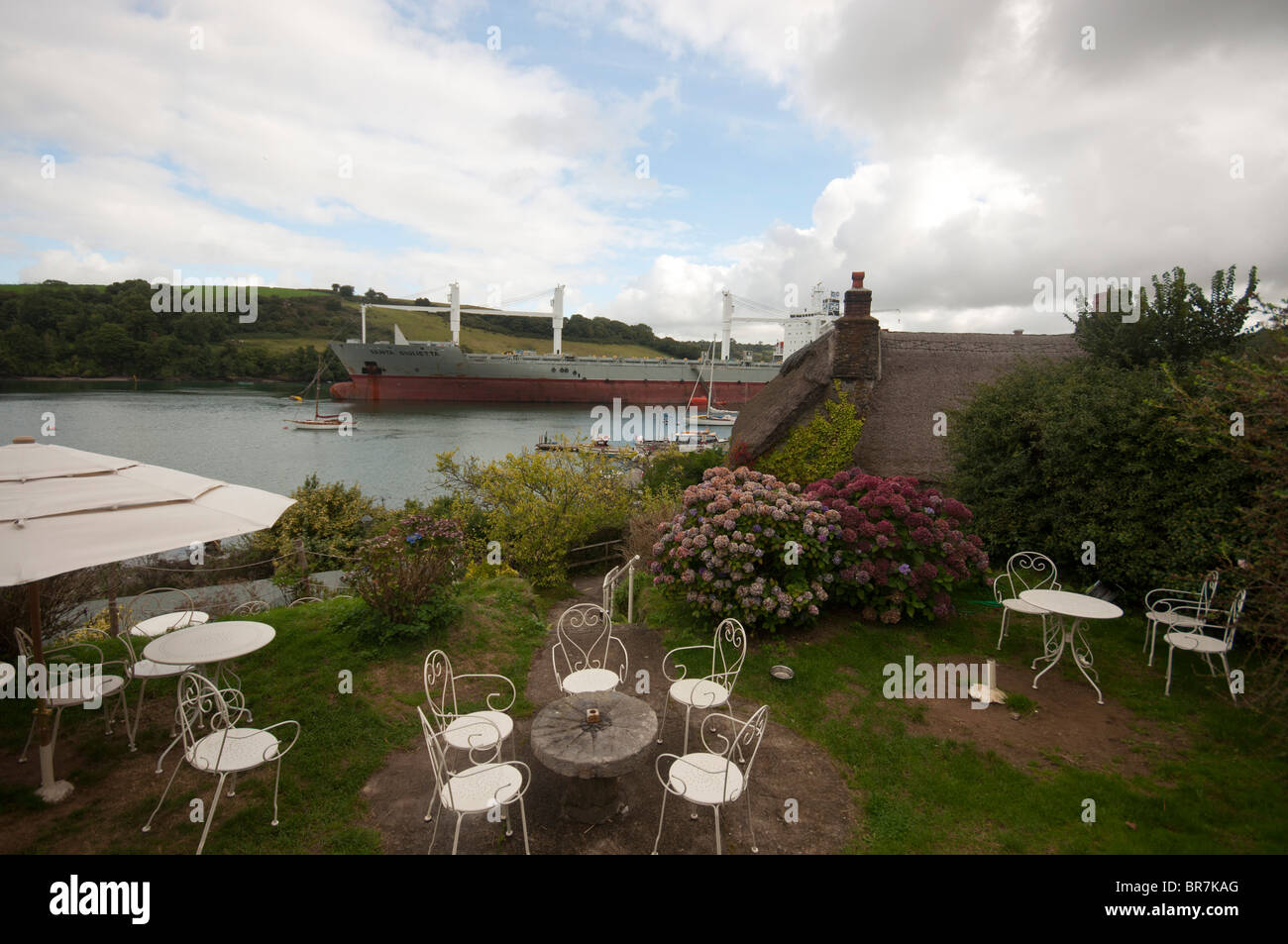 laid up shipping on the river Fal by the 15th century smugglers cottage ...