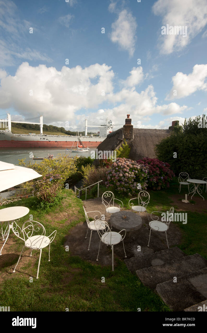 laid up shipping on the river Fal by the 15th century smugglers cottage ...