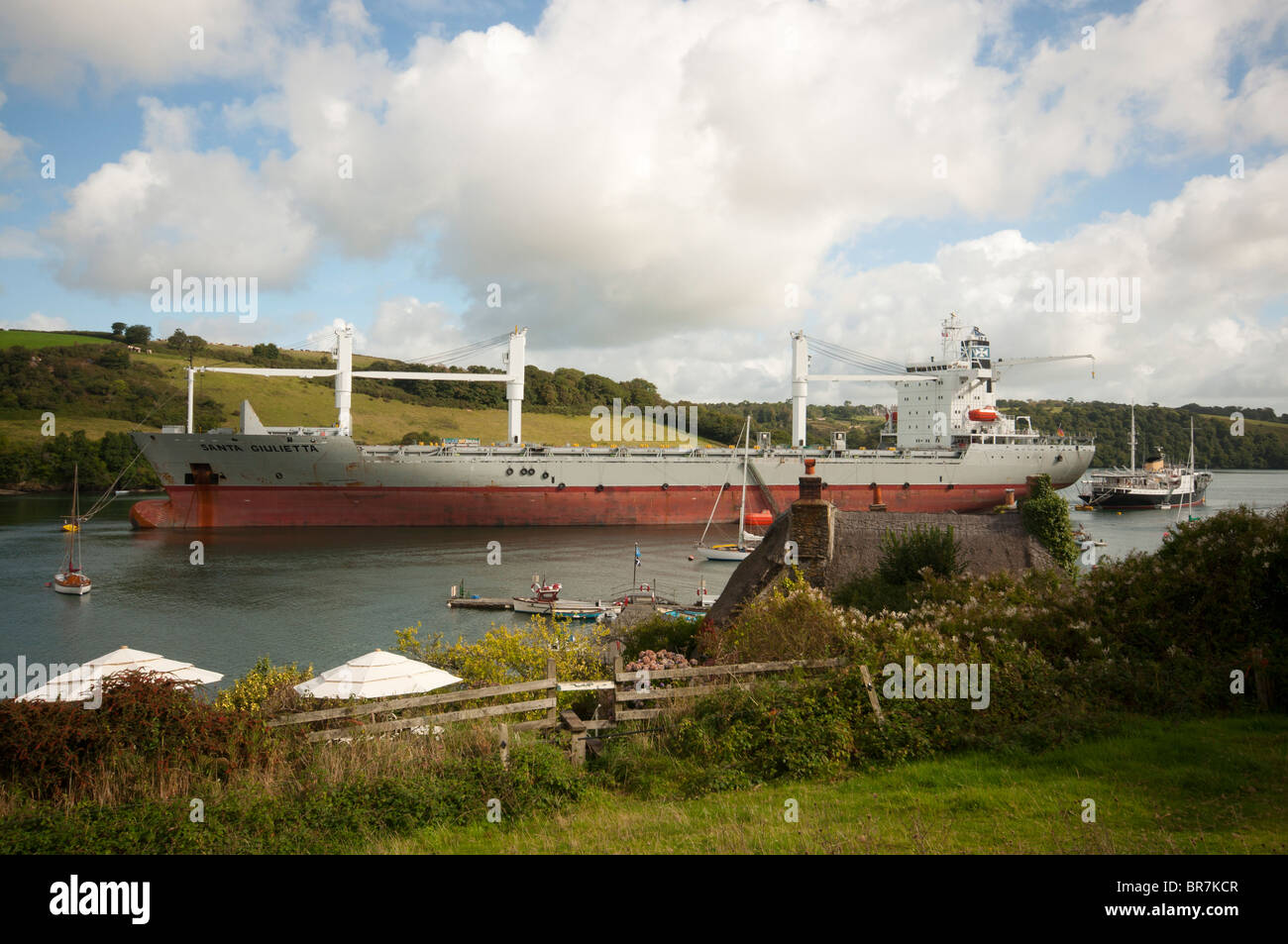 laid up shipping on the river Fal by the 15th century smugglers cottage ...