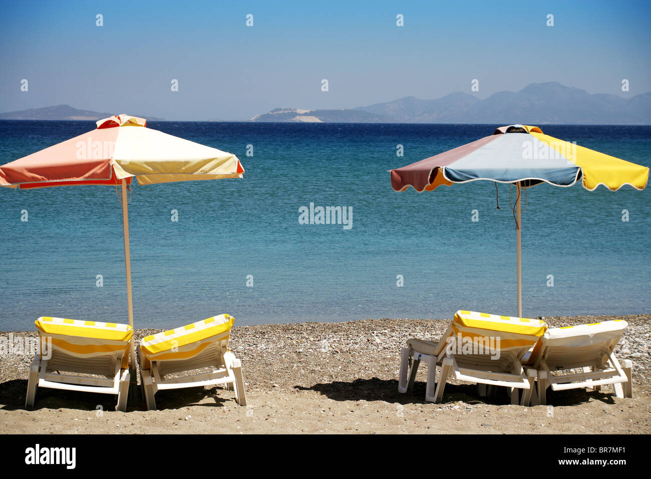Sunny beach scene, Kefalos, Greece Stock Photo - Alamy