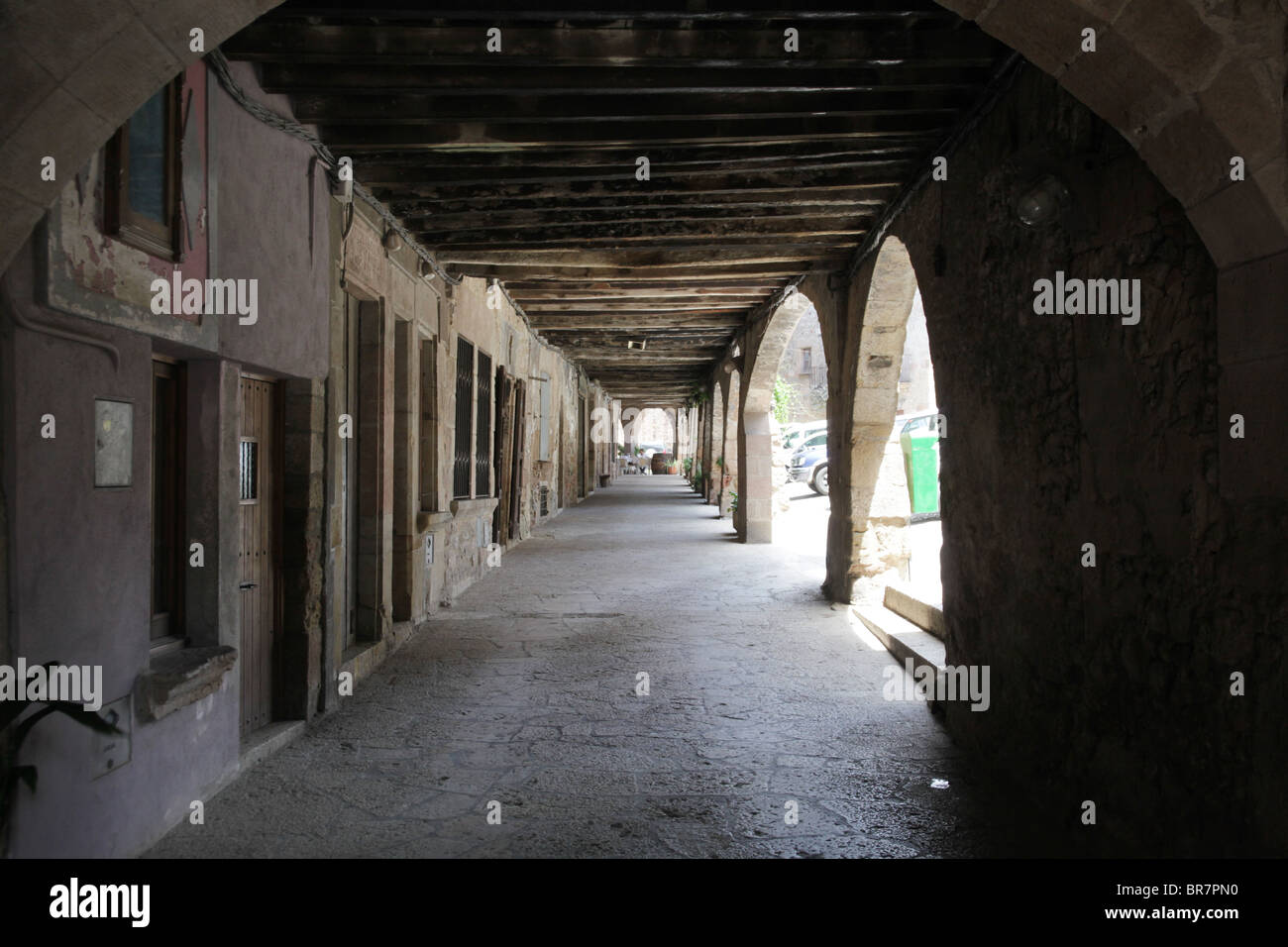 Main square Medieval Santa Pau in the Volcanic Zone National Park near ...