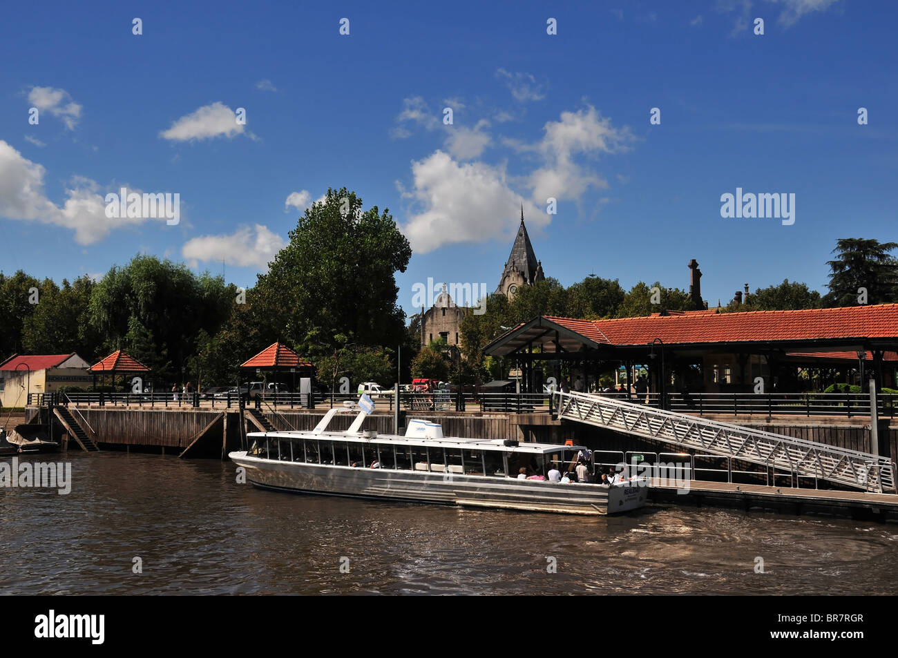 Single deck tour barge moored at the Estacion Fluvial Boat Terminal ...
