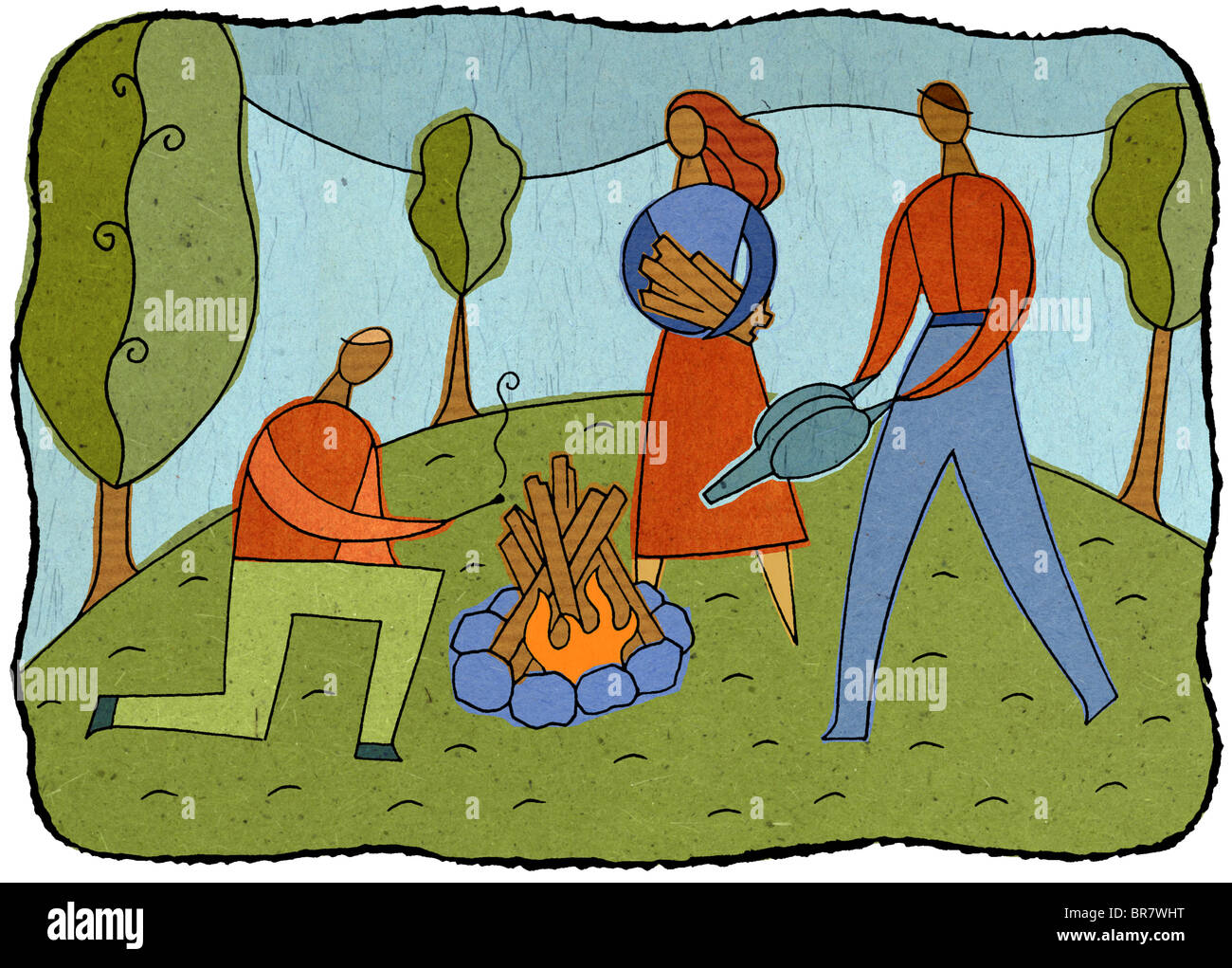 Three people lighting a camp fire Stock Photo - Alamy