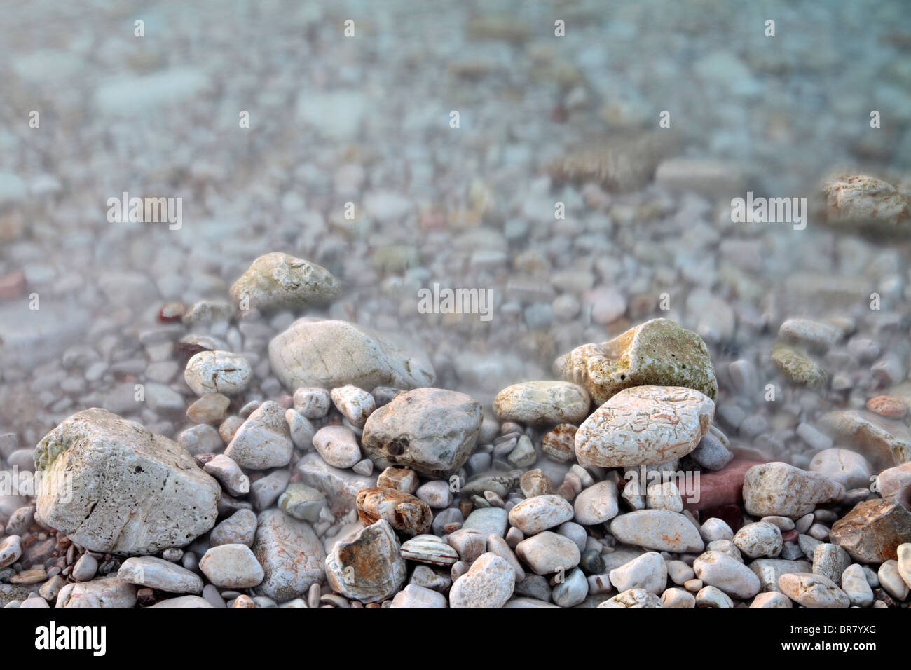Pebbles on Beach Stock Photo - Alamy
