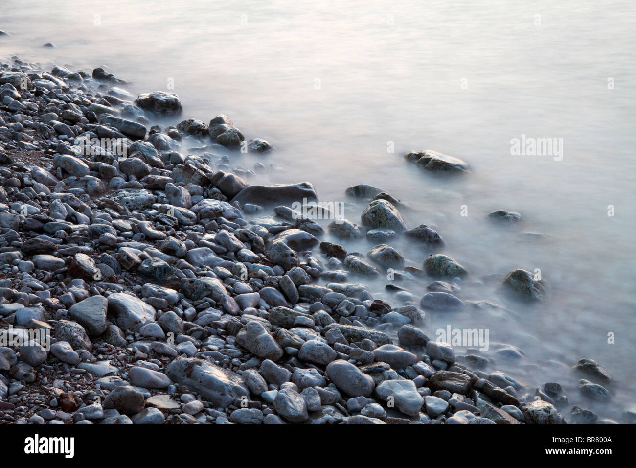 Pebbles on Beach Stock Photo - Alamy