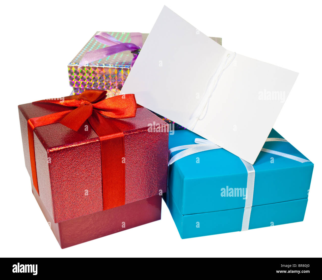 A pile of presents and a gift tag with copy space Stock Photo - Alamy