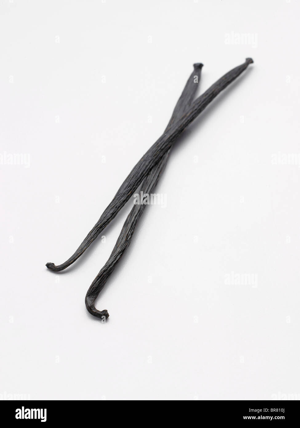 Two Vanilla Pods on white background Stock Photo - Alamy