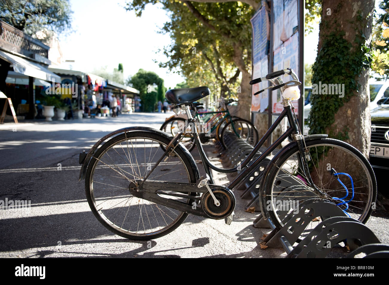 Bicycle in rack at Sirmione, northern Italy Stock Photo - Alamy