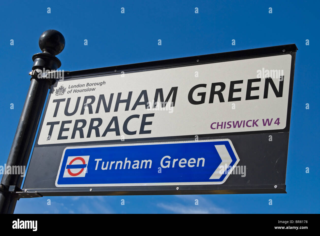 street sign for turnham green terrace and turnham green tube station in ...