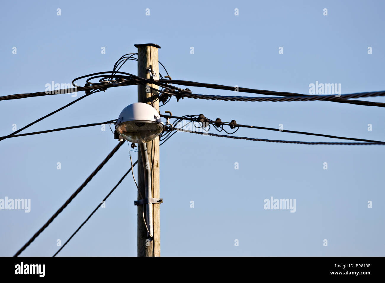 Lamp post with power lines Stock Photo - Alamy