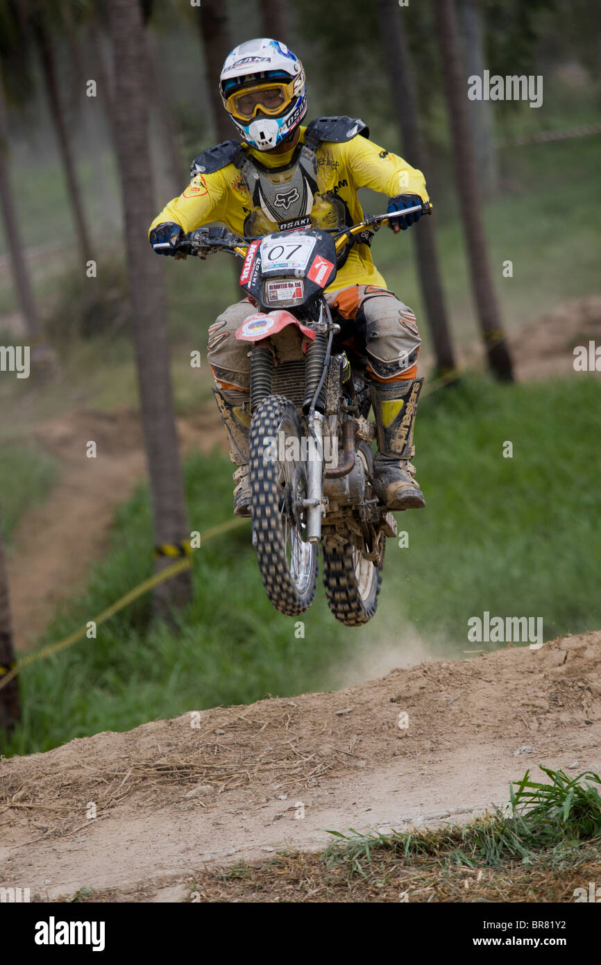 A rider jumps at a motocross event Stock Photo - Alamy