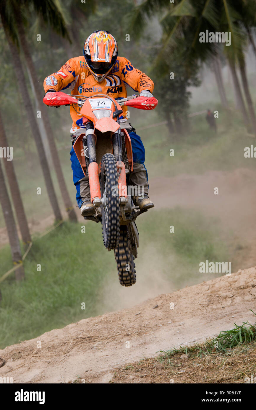 A rider jumps at a motocross event Stock Photo - Alamy