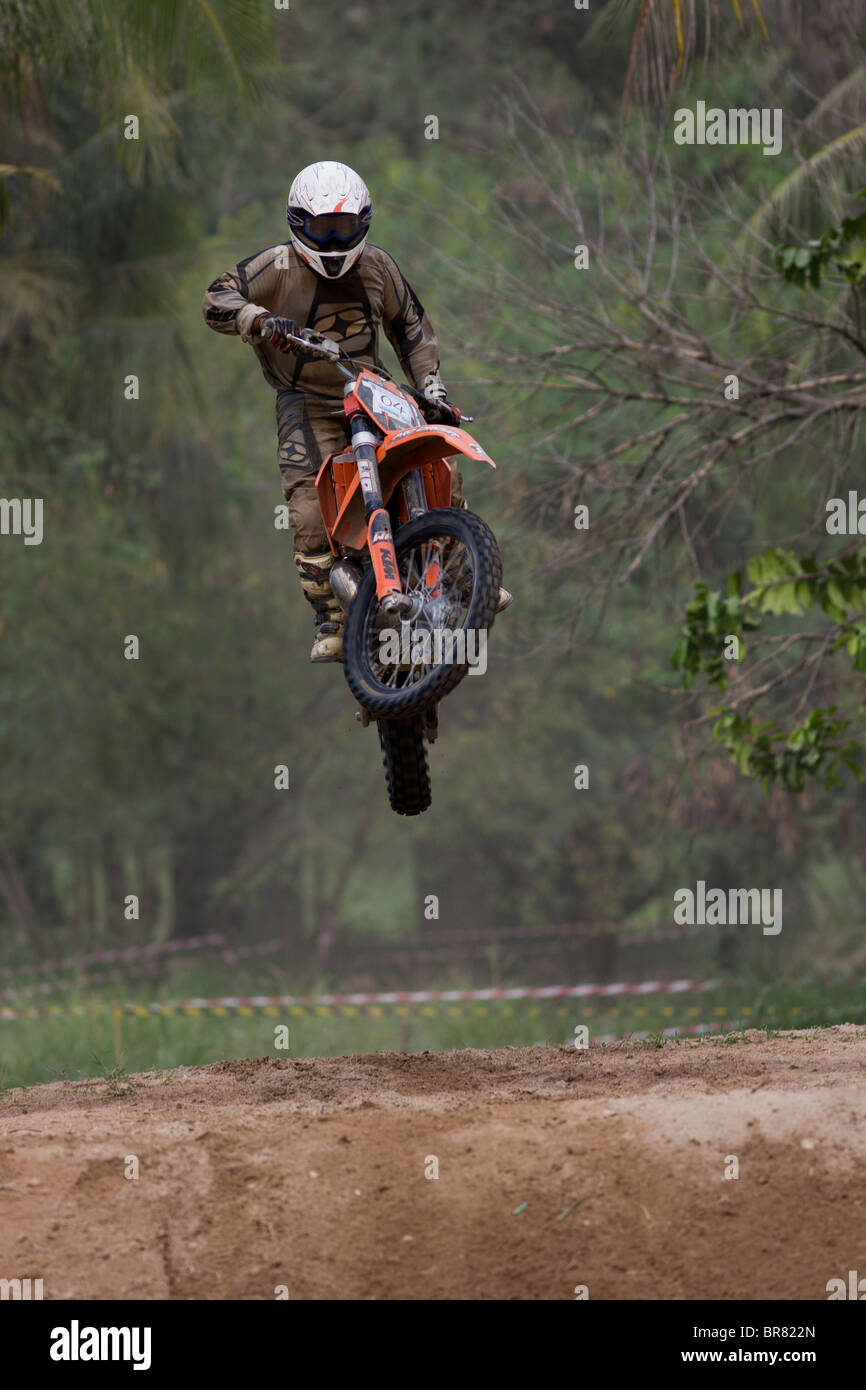 A rider jumps at a motocross event Stock Photo - Alamy