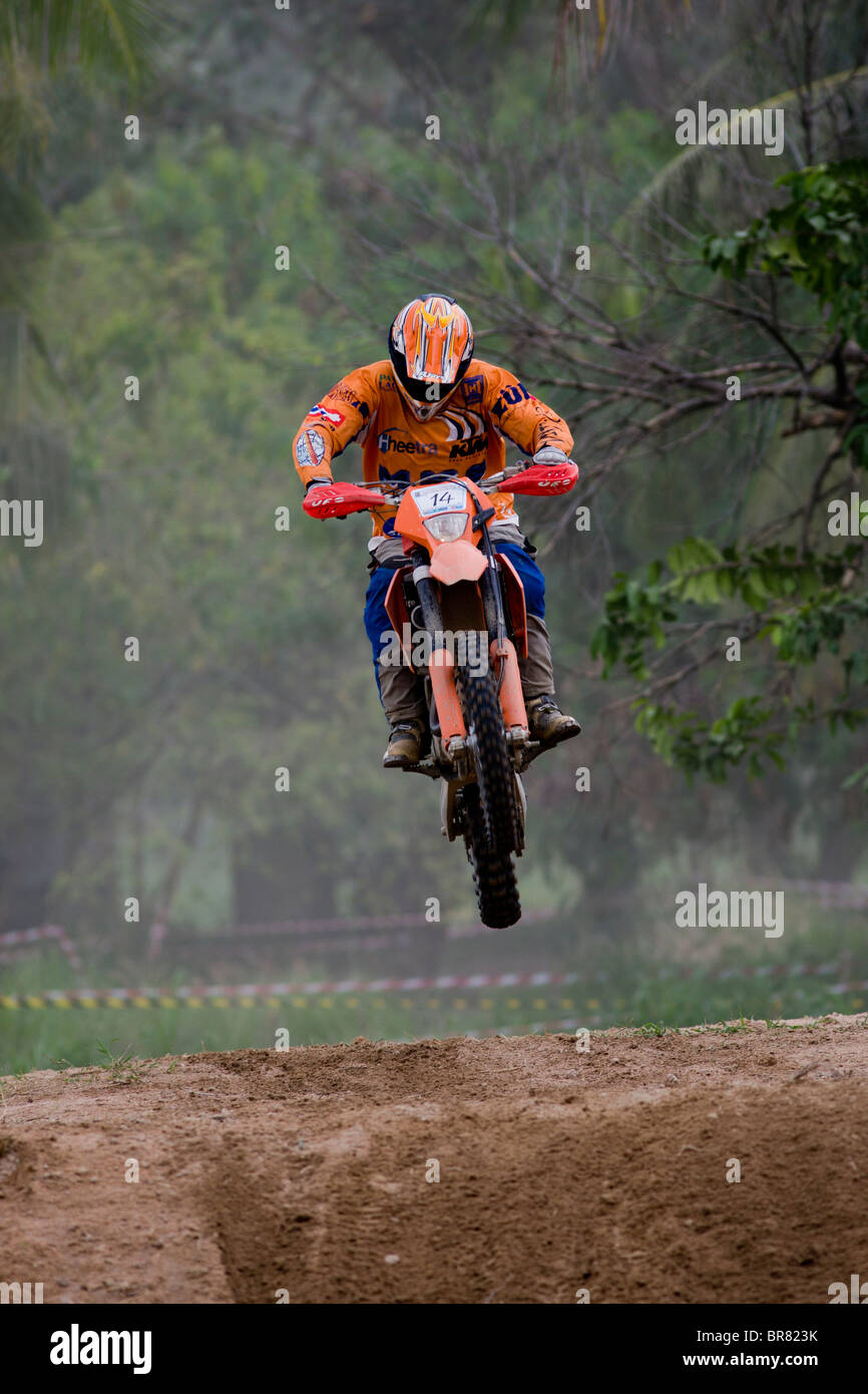 A rider jumps at a motocross event Stock Photo - Alamy