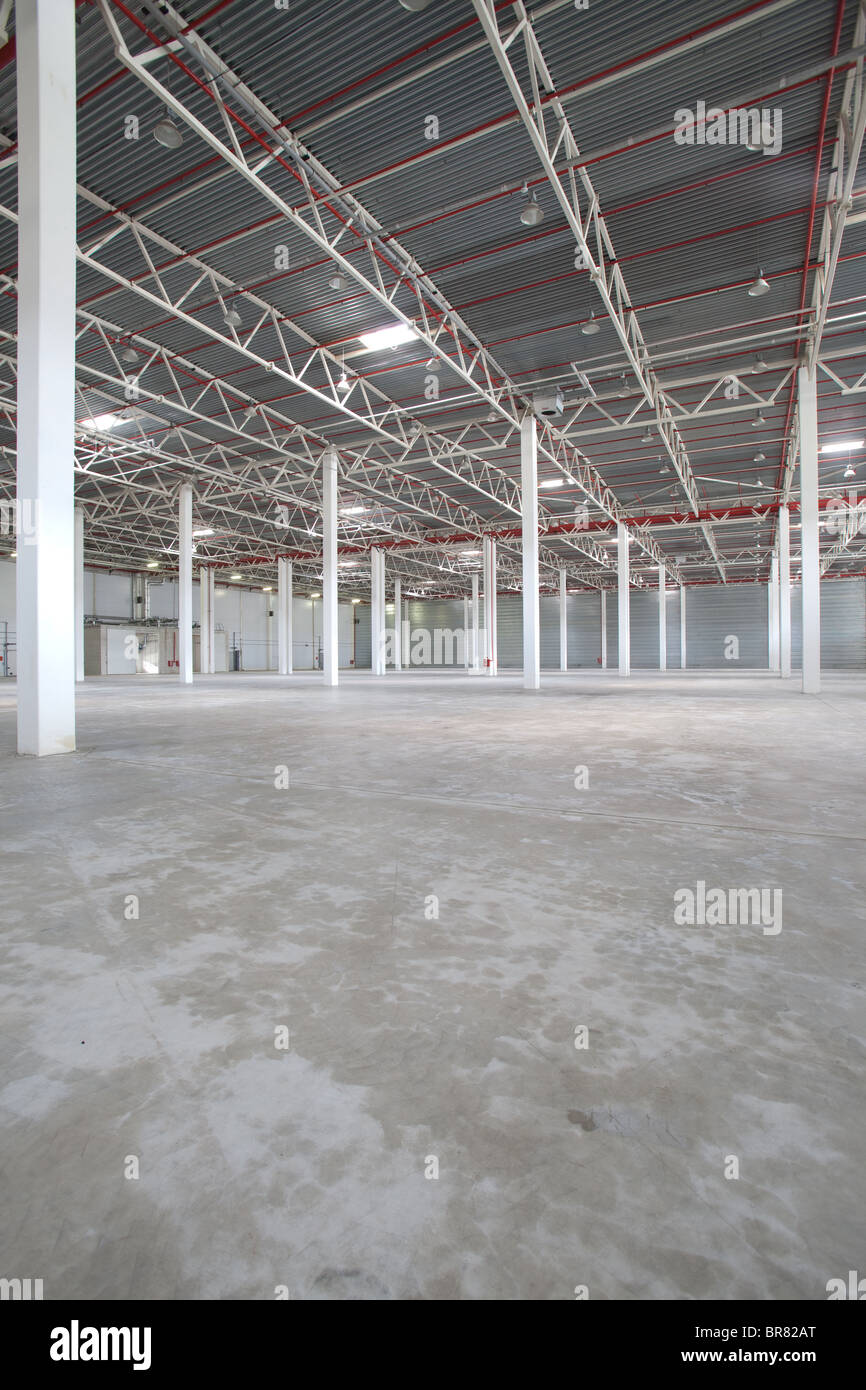 Interior of a modern warehouse, clean and empty Stock Photo - Alamy